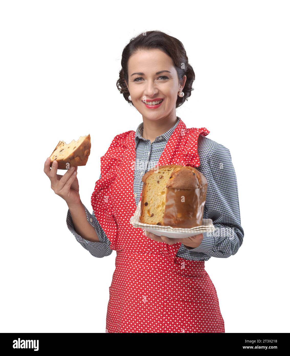 Vintage woman in apron eating a slice of panettone, traditional italian ...