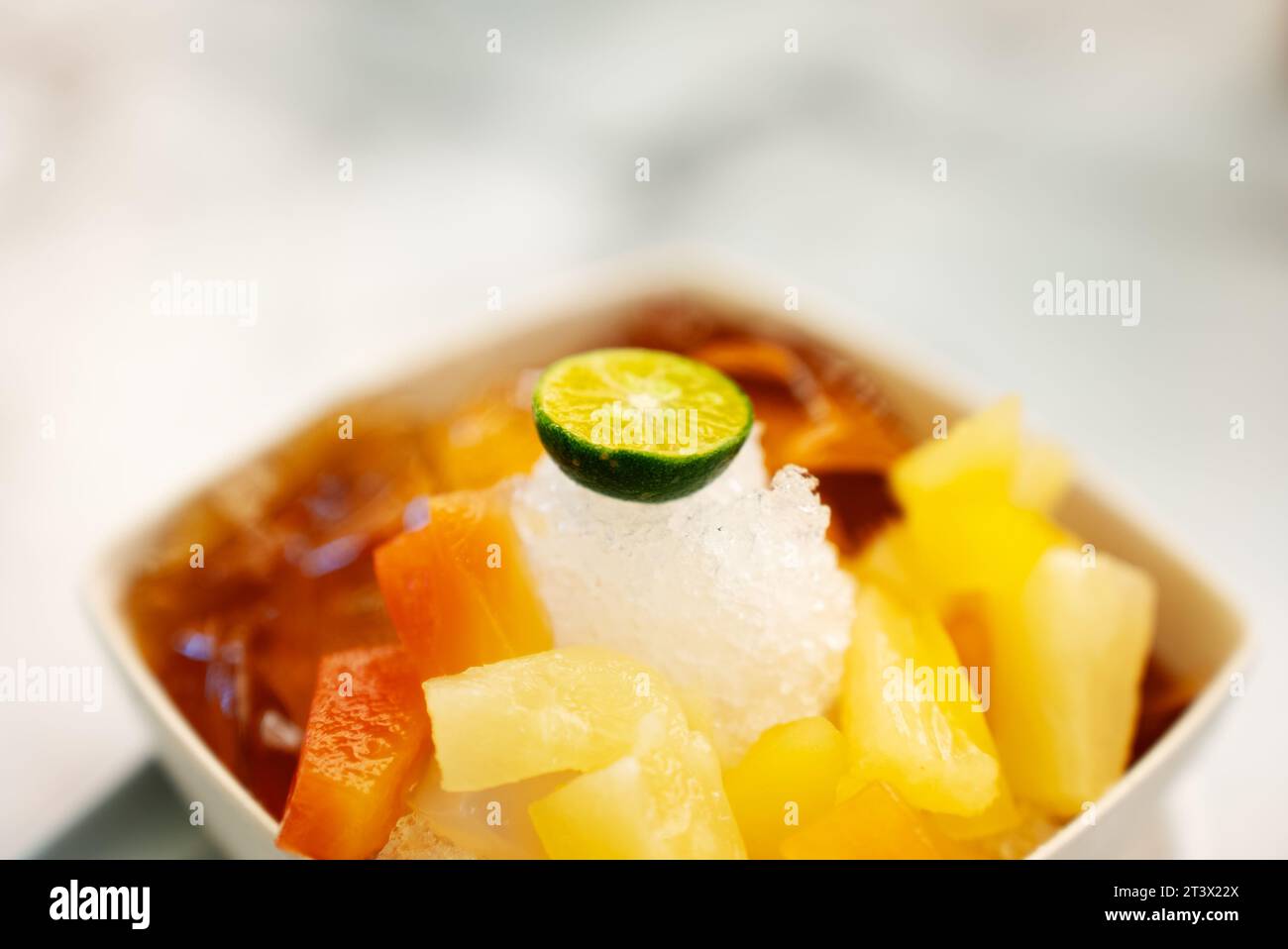 Mixed fruit ice or called es buah campur in Indonesia, with a lime on ...