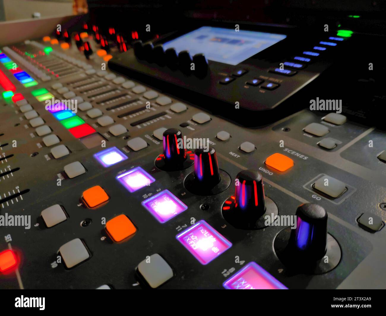Professional music console background, sound equipment close view, dark ...