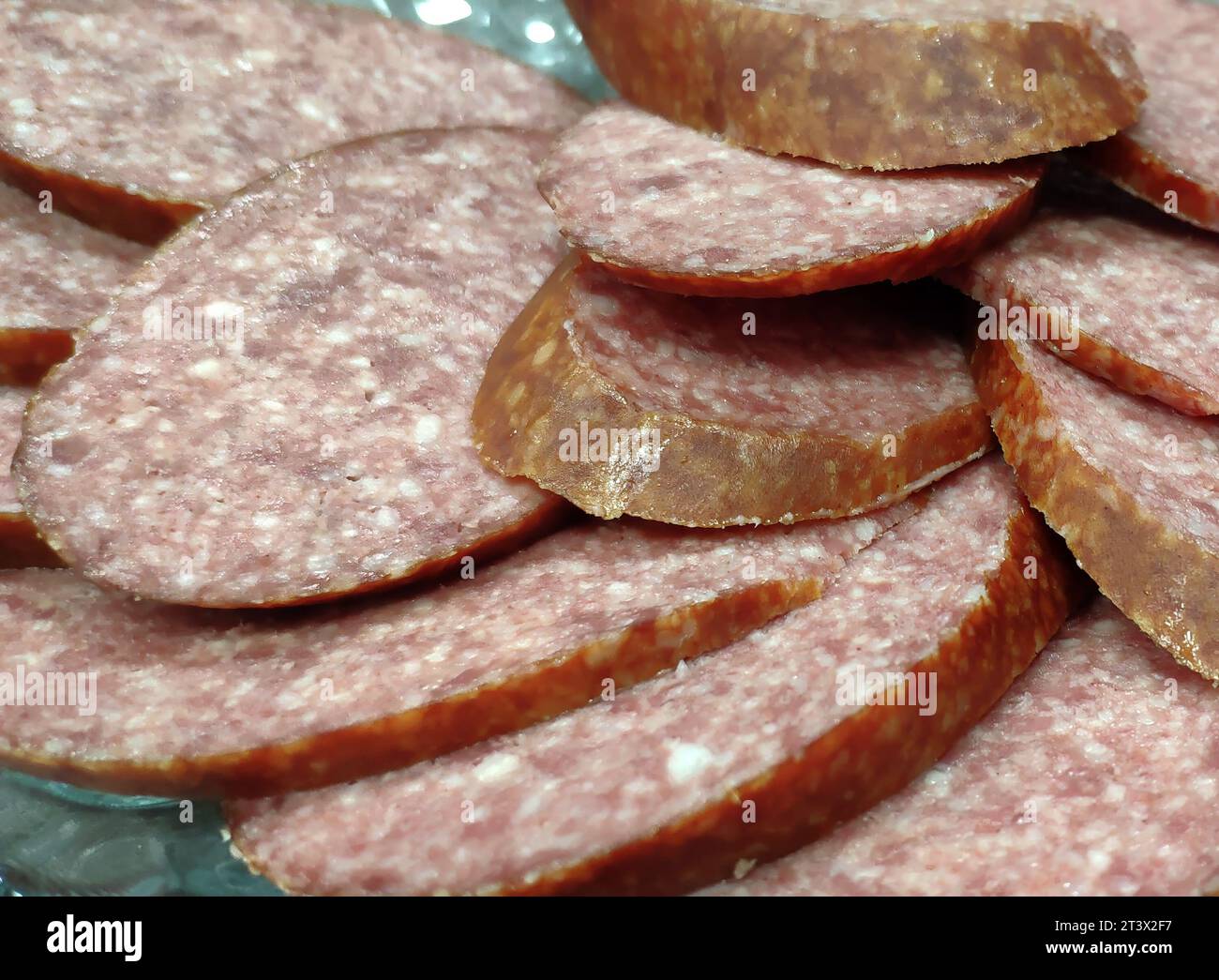 Sausage dish close view, sliced meat for dinner. Tasty meat dish photo ...