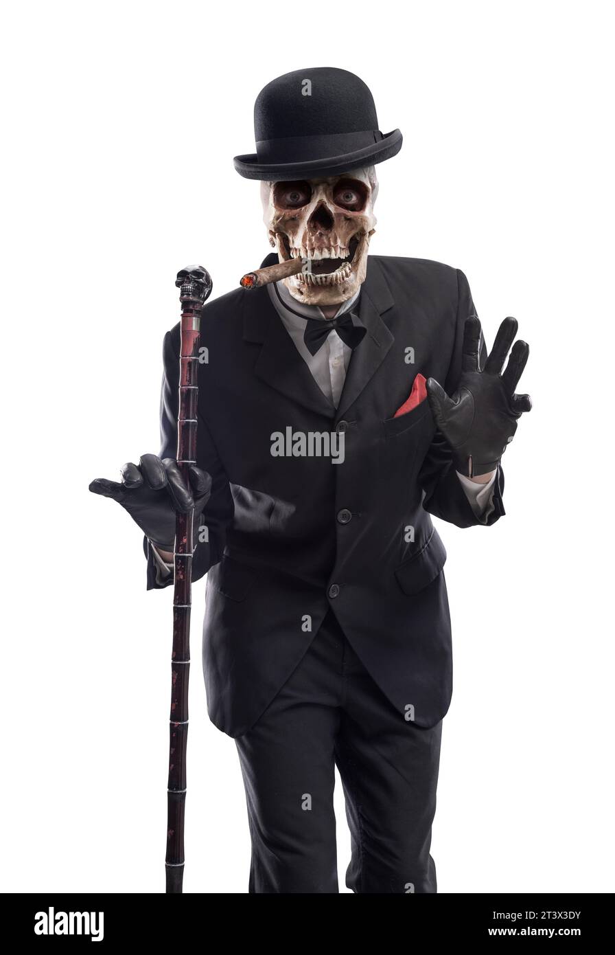 Evil elegant Halloween character with skull head posing and looking at ...