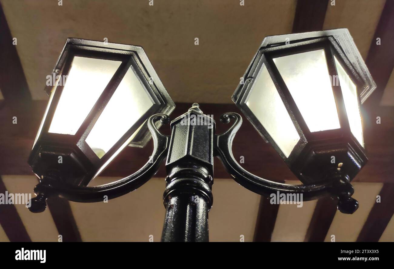 Old street lights in the dark background, vintage lamps, architecture ...