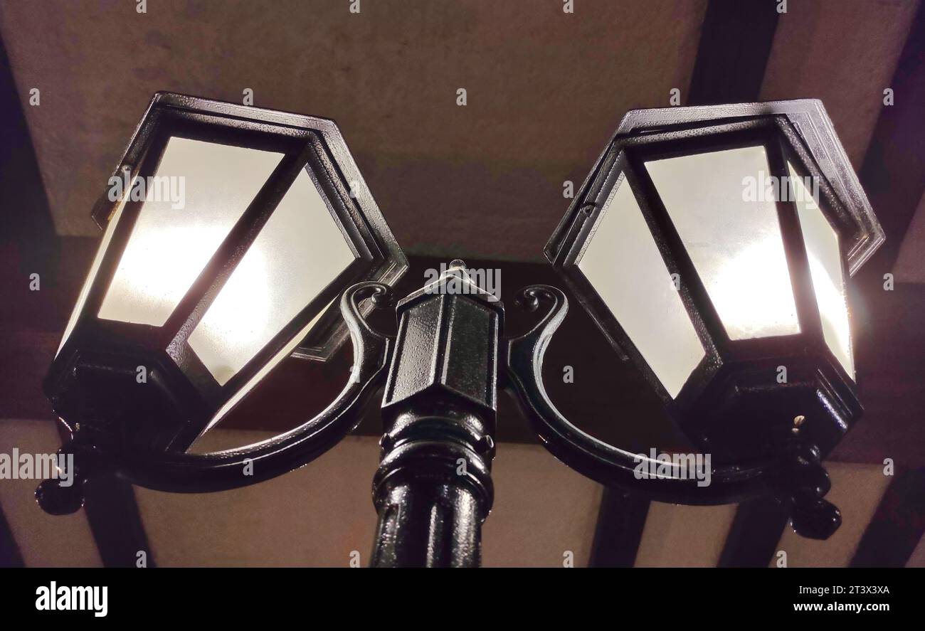 Old street lights in the dark background, vintage lamps, architecture ...