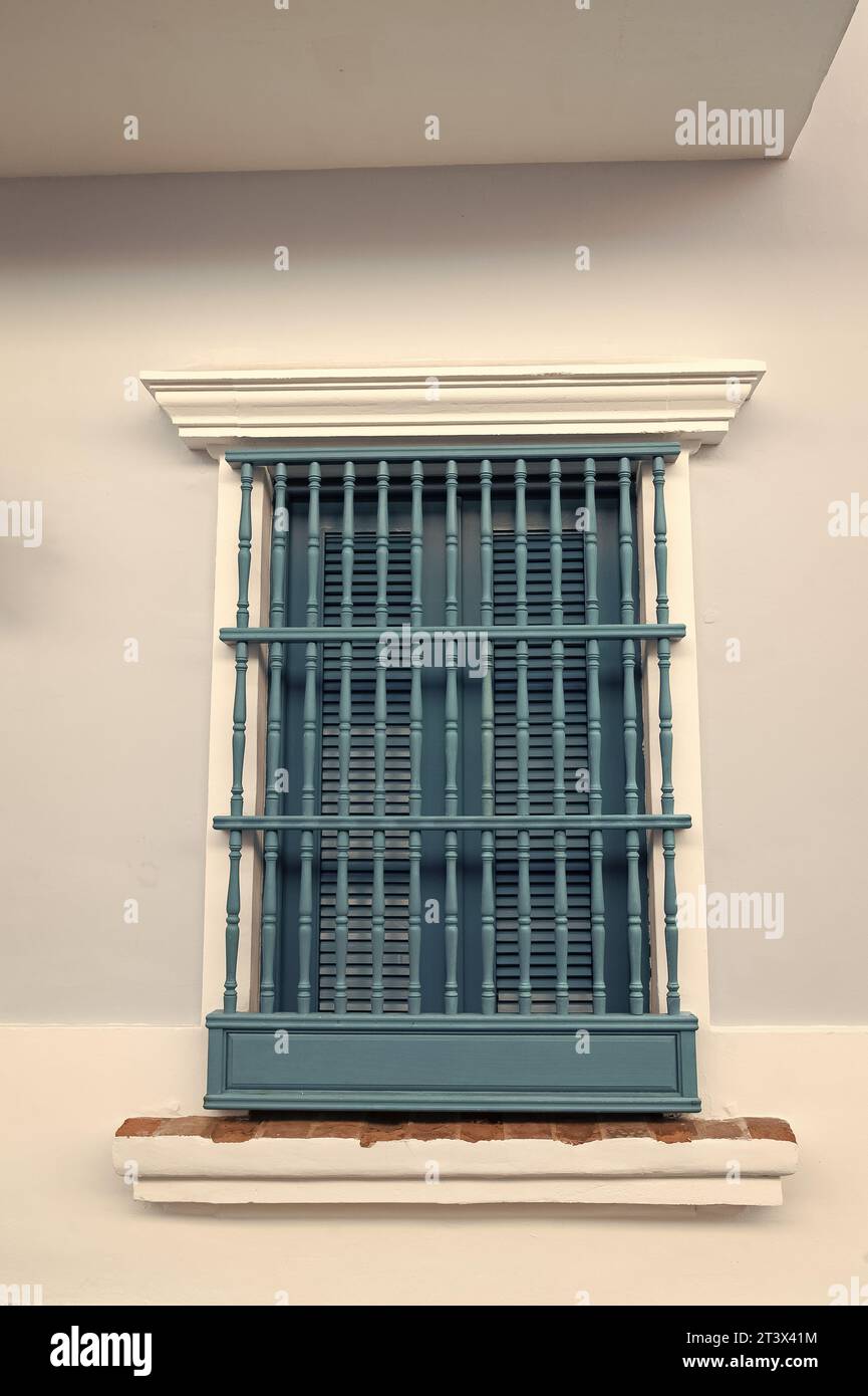 house with blue window outdoor. building with window outside. window ...