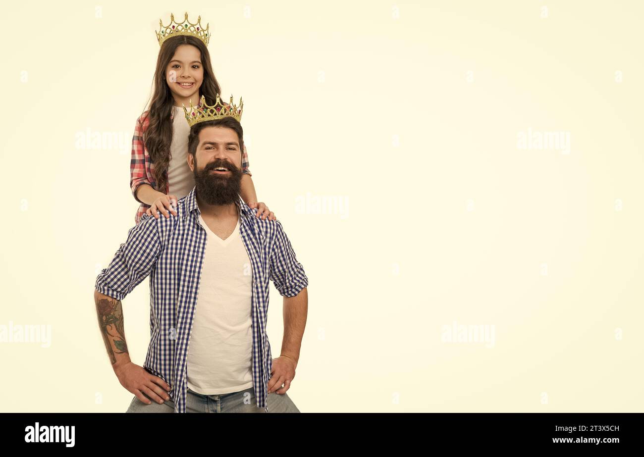 Check your ego. Egoist family. Little girl and bearded man wear crowns ...