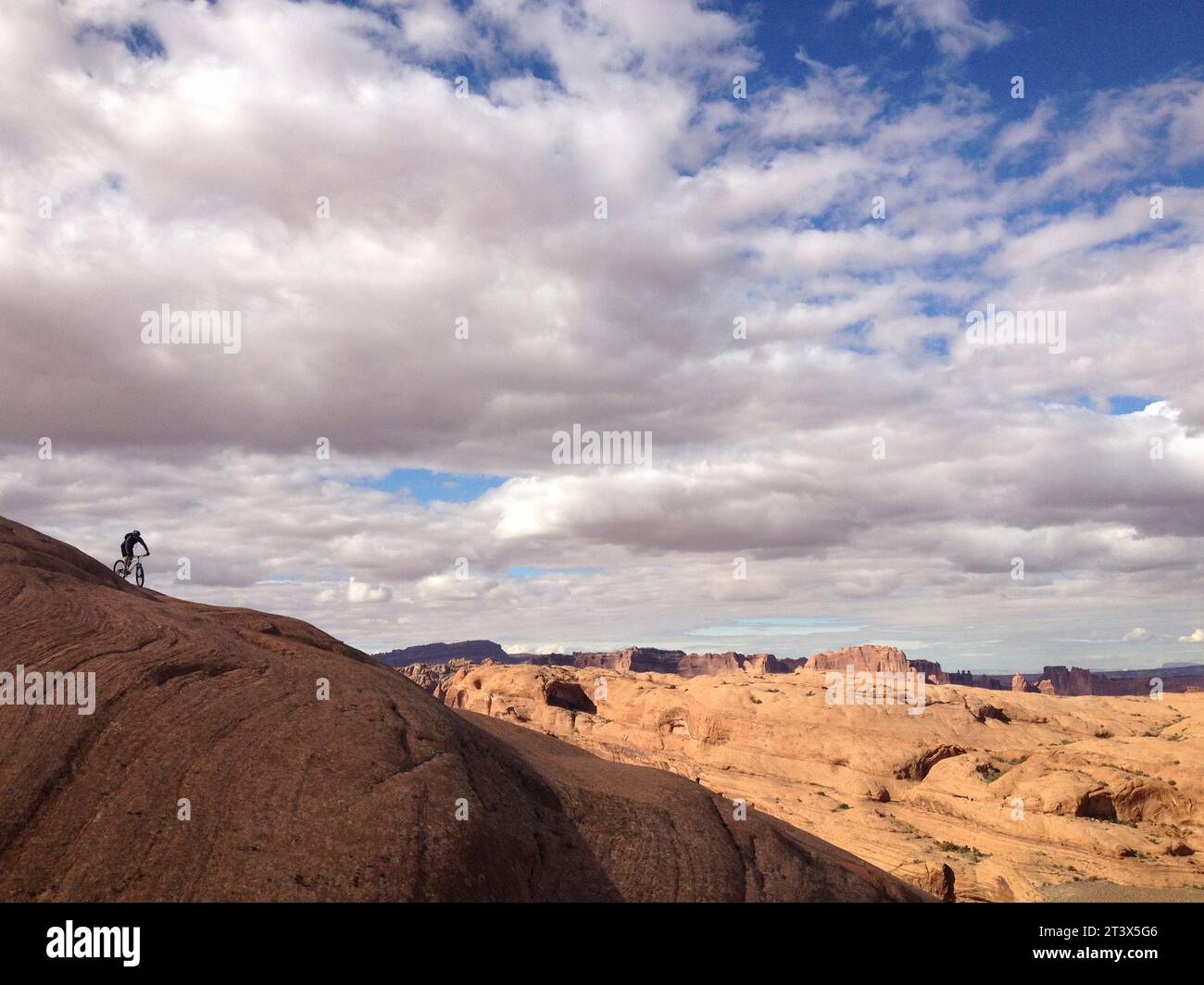 Mountain biker riding on the Slickrock trail near Moab, Utah.PLEASE ...