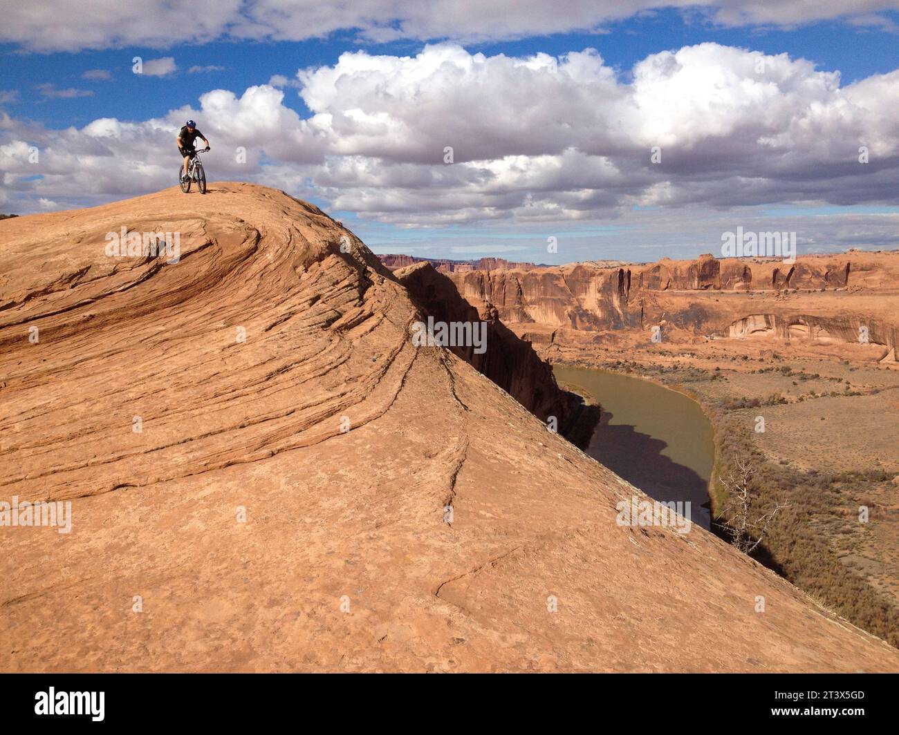 Mountain biker riding on the Slickrock trail near Moab, Utah.PLEASE ...