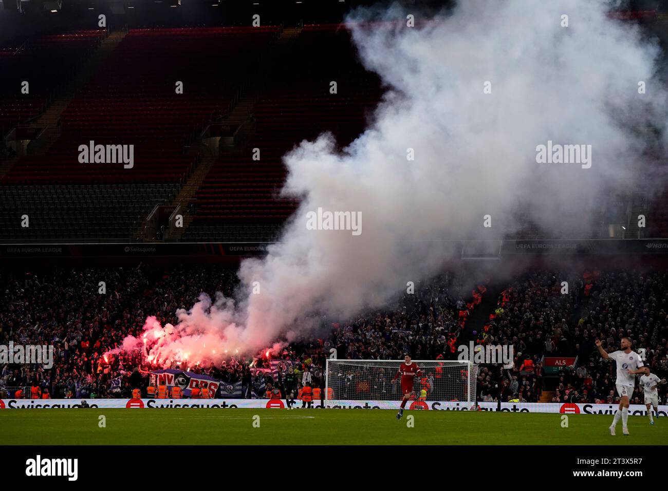 Liverpool, UK. 26th Oct, 2023. Toulouse fans with flares during the ...