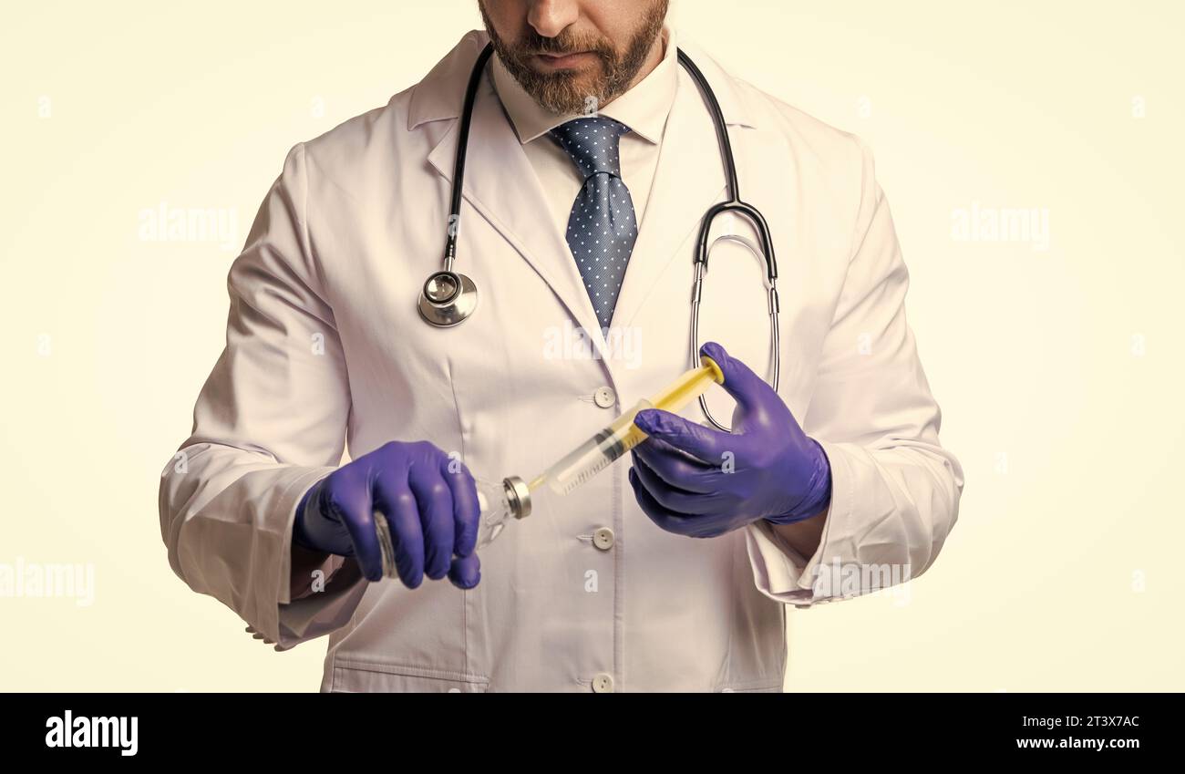 cropped view of doctor do vaccination injection in studio. doctor do ...