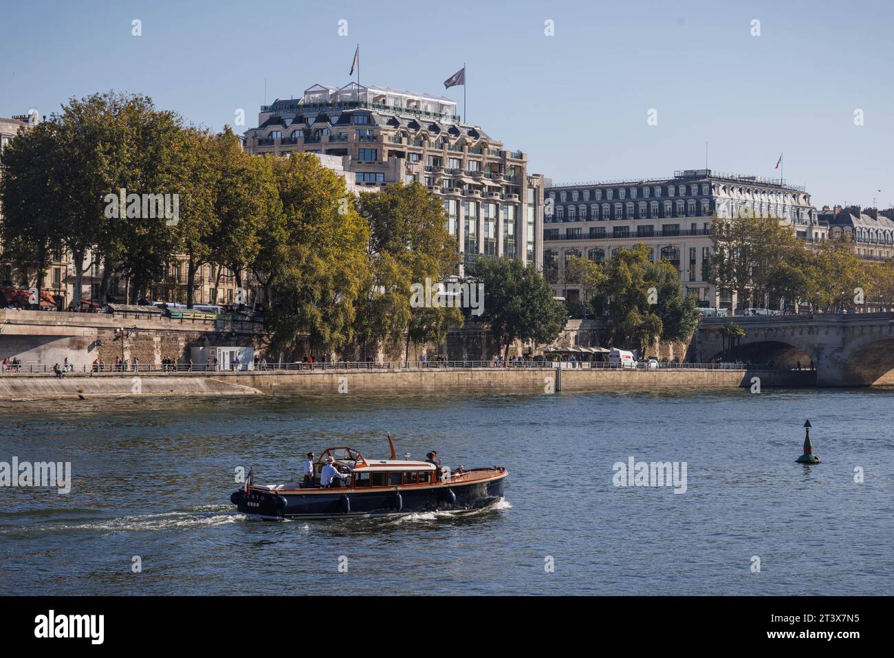 A boat cruises along the Seine River in Paris, France Stock Photo - Alamy