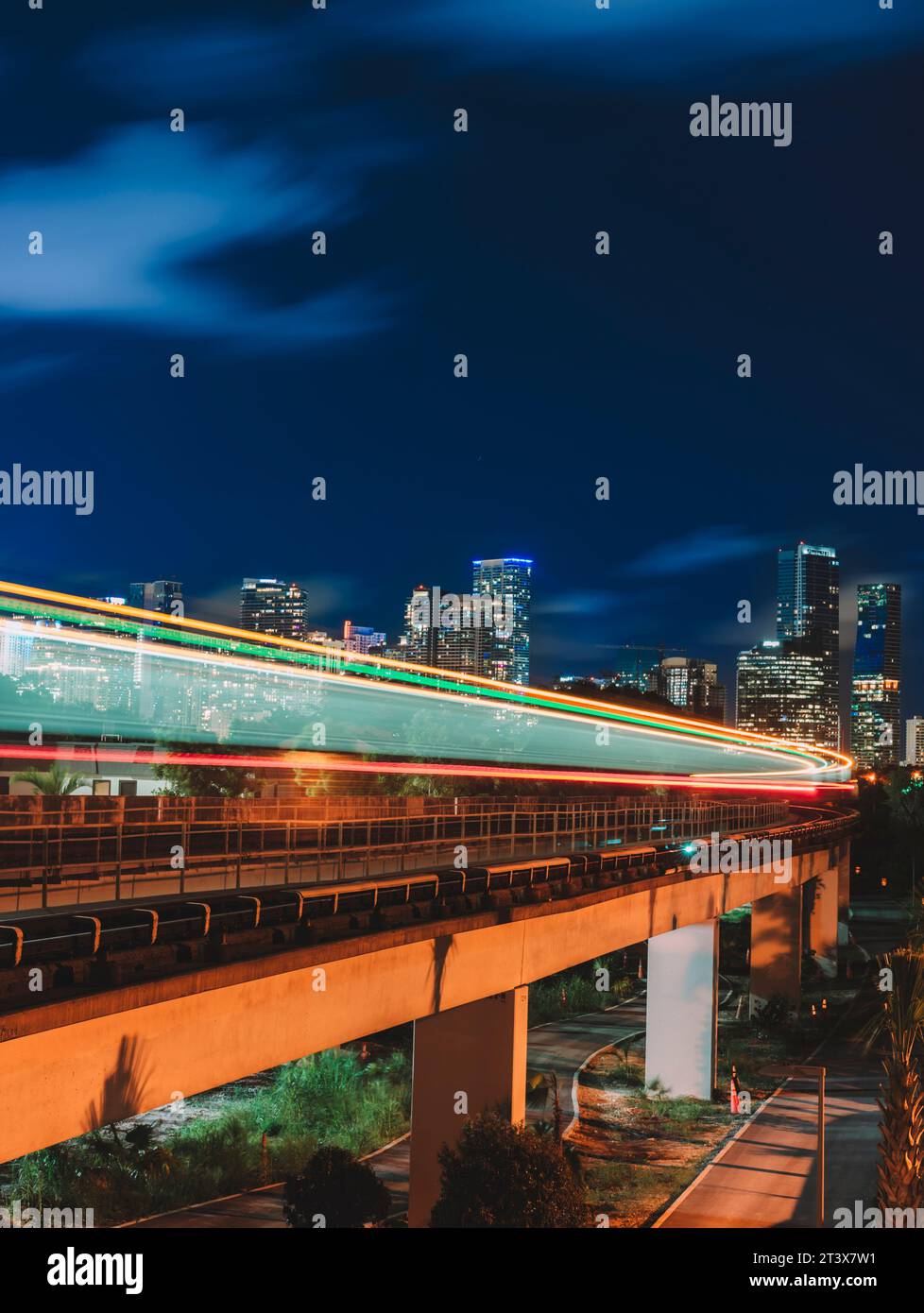 train views miami skyline night Stock Photo - Alamy