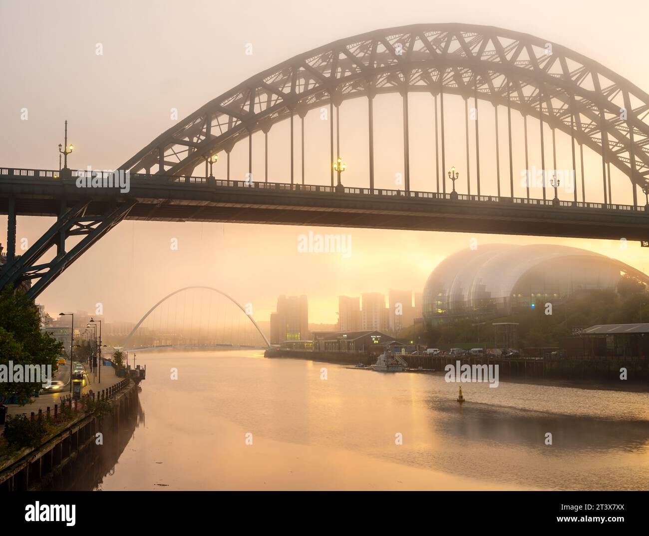Tyne Bridge, Sage Centre and Millenium Bridge on a misty autumn dawn in ...
