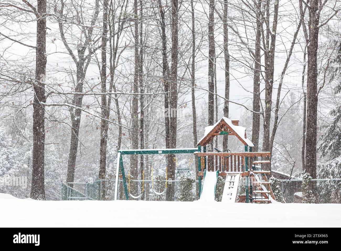 Playground in Winter Snow Storm Stock Photo - Alamy