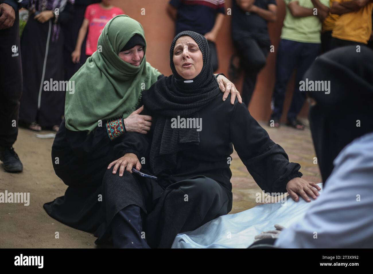 Khan Yunis, Palestinian Territories. 27th Oct, 2023. Relatives of the ...