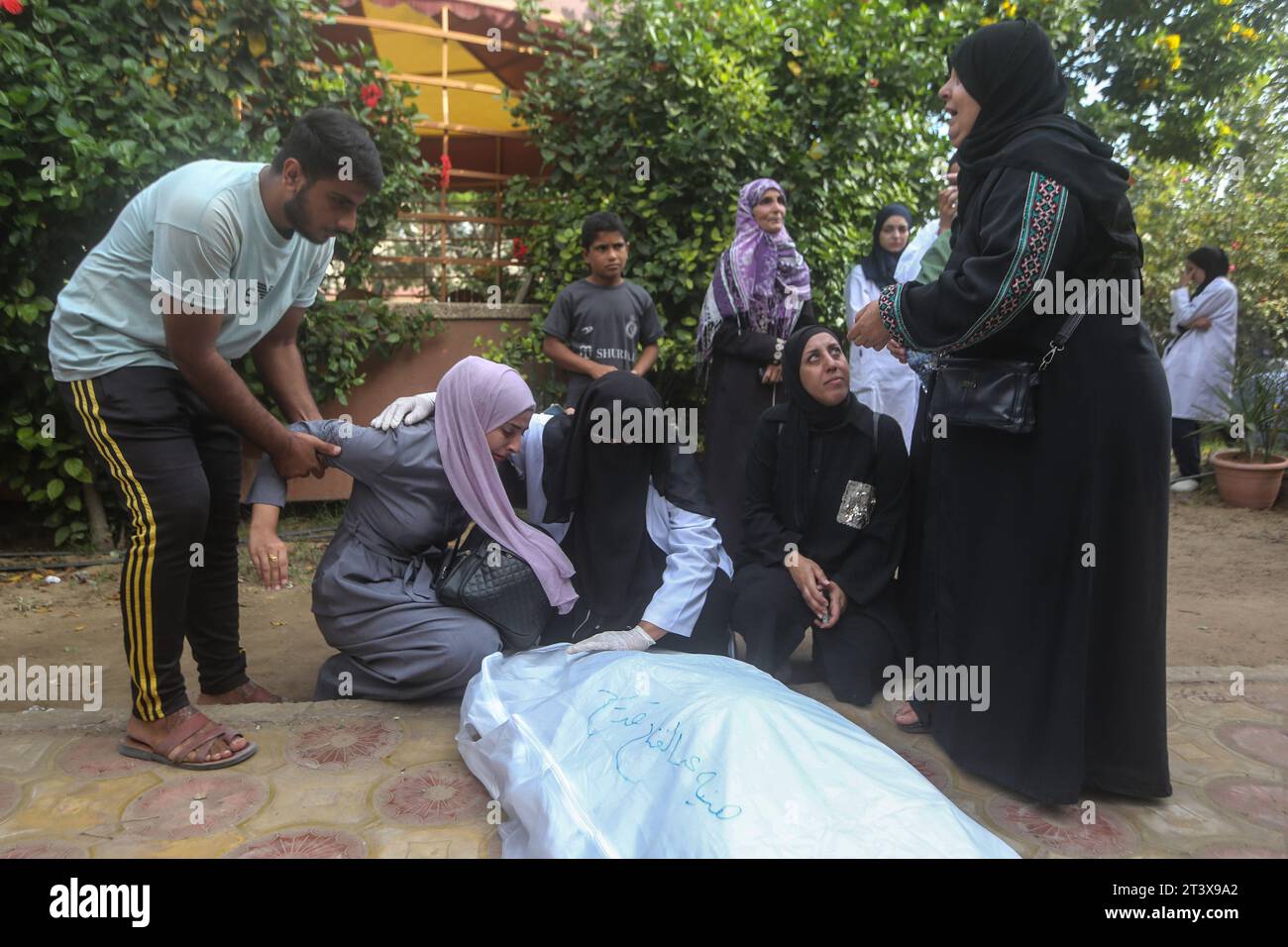 Khan Yunis, Palestinian Territories. 27th Oct, 2023. Relatives of the ...