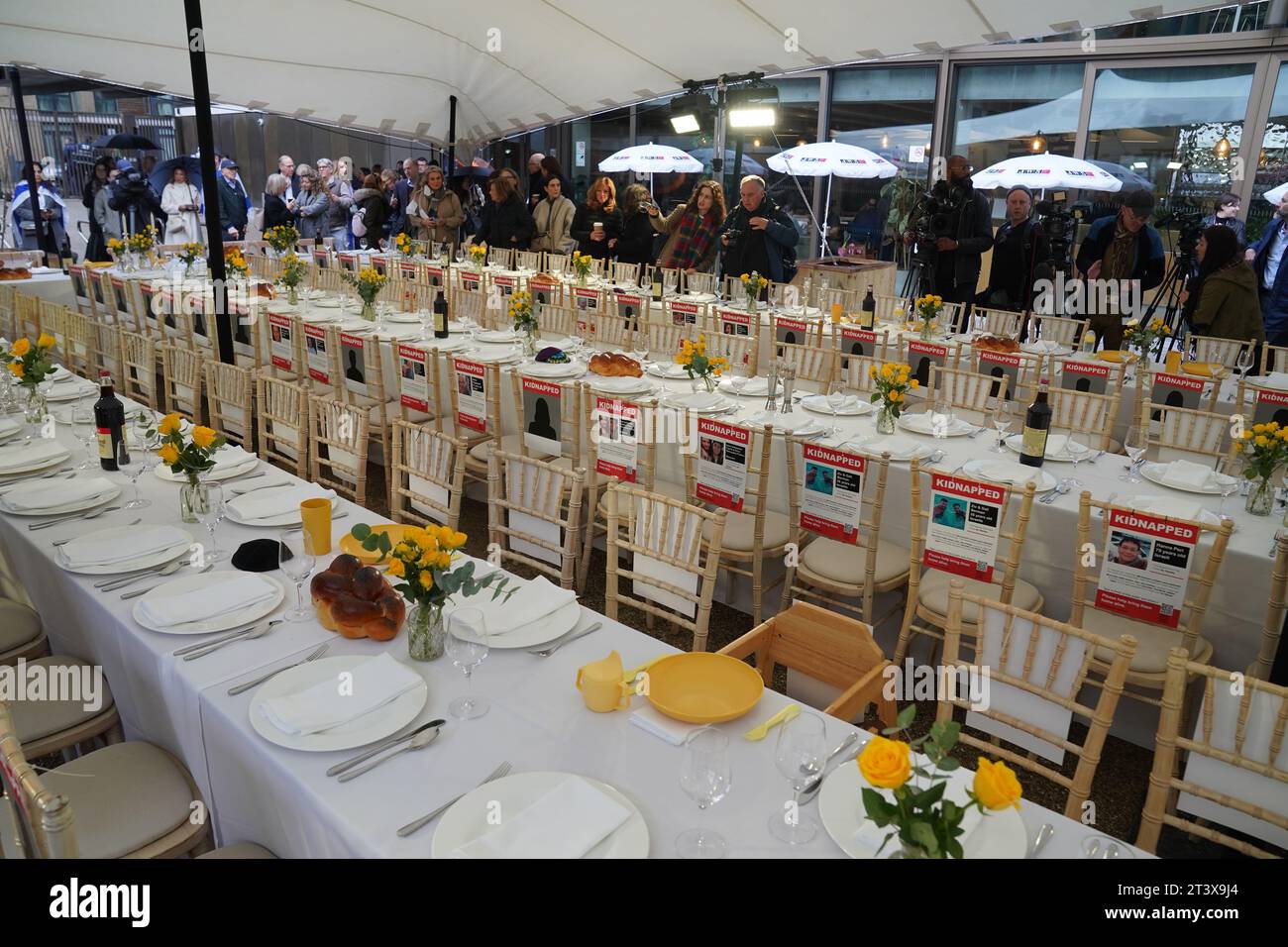 The Empty Shabbat Table installation, an empty dining table set for ...