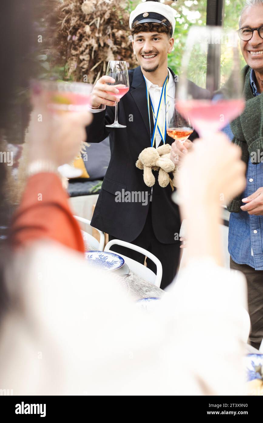 Happy mature toasting glass hi-res stock photography and images - Alamy