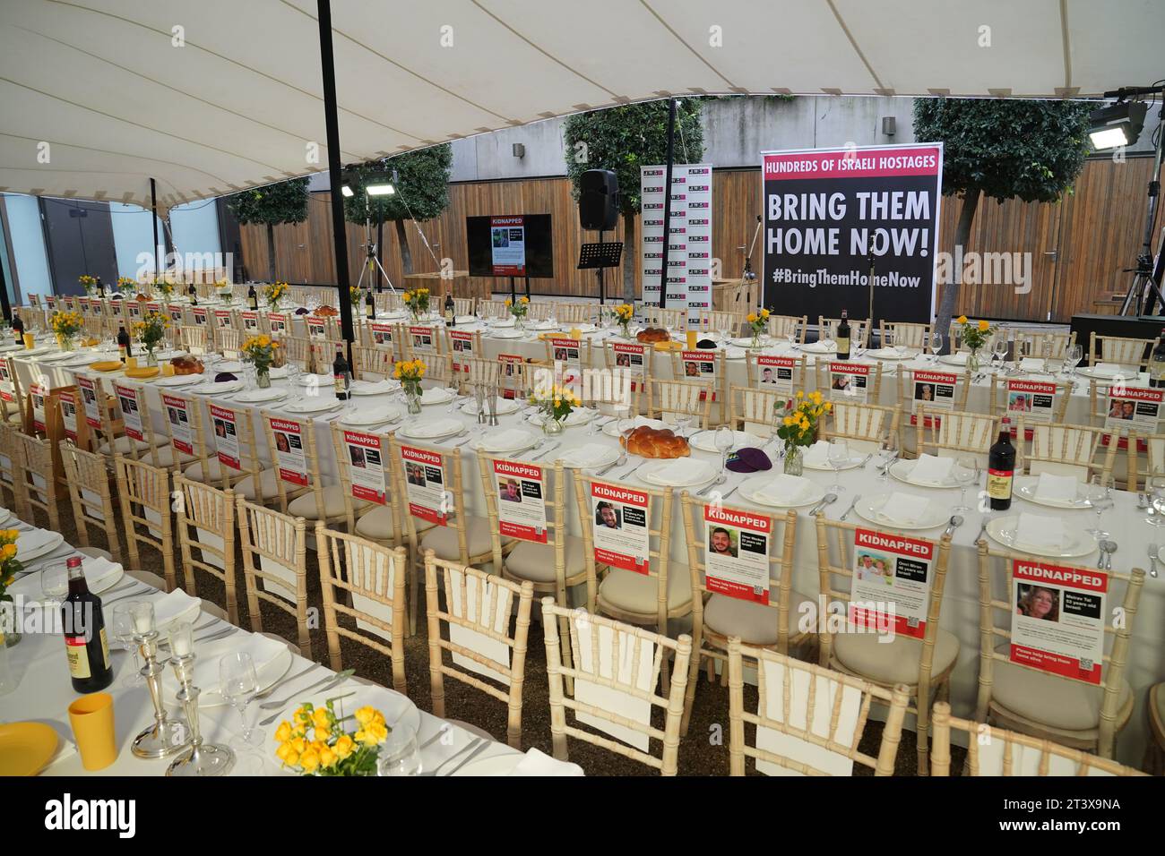 The Empty Shabbat Table installation, an empty dining table set for ...