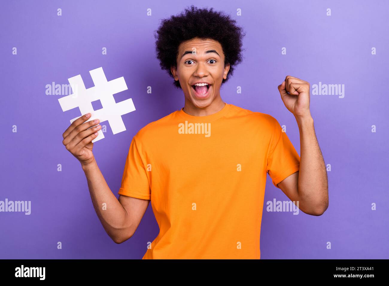 Photo of young guy blogger famous popularity fist up celebrate his ...