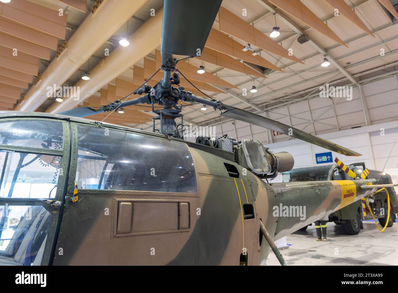 Military helicopter stand inside big pavilion Stock Photo - Alamy