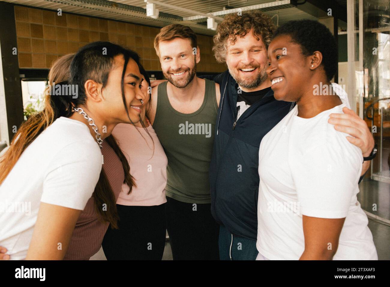 Happy multiracial business colleagues enjoying at workplace Stock Photo ...