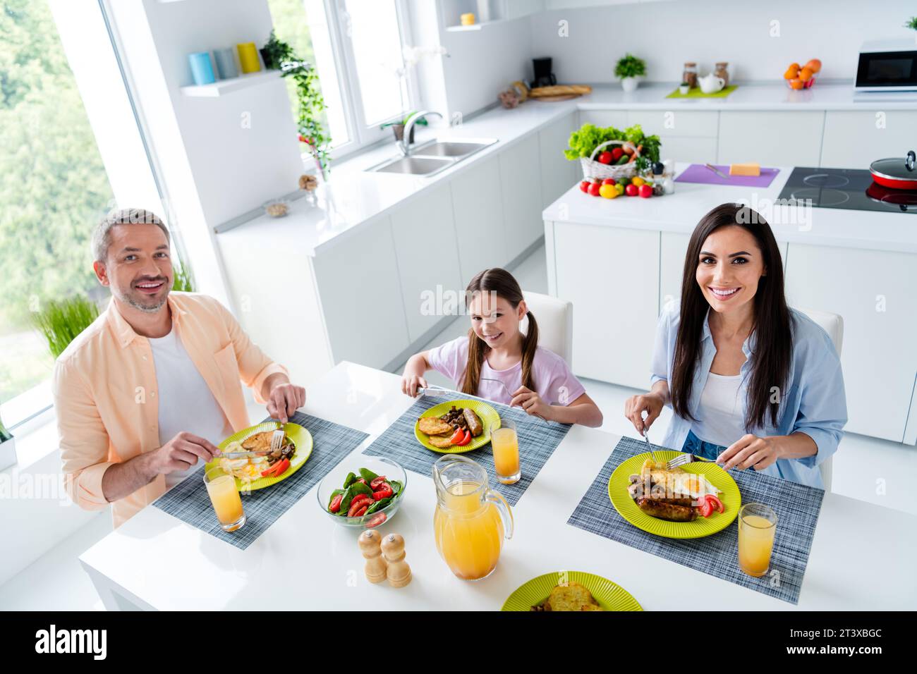 High angle view photo of cute little girl positive satisfied parents ...