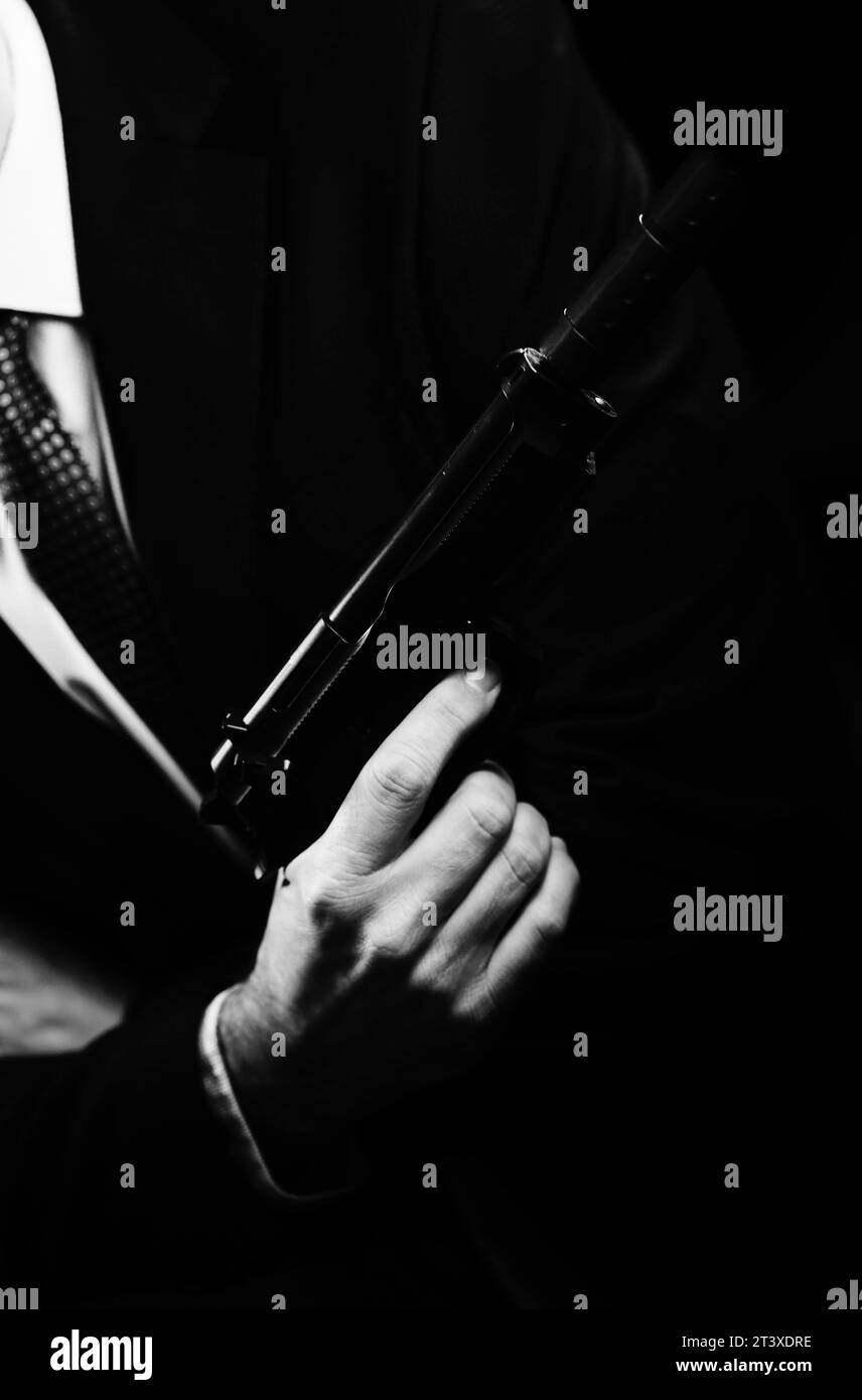 Well dressed male secret agent detective spy wearing suit and tie ...