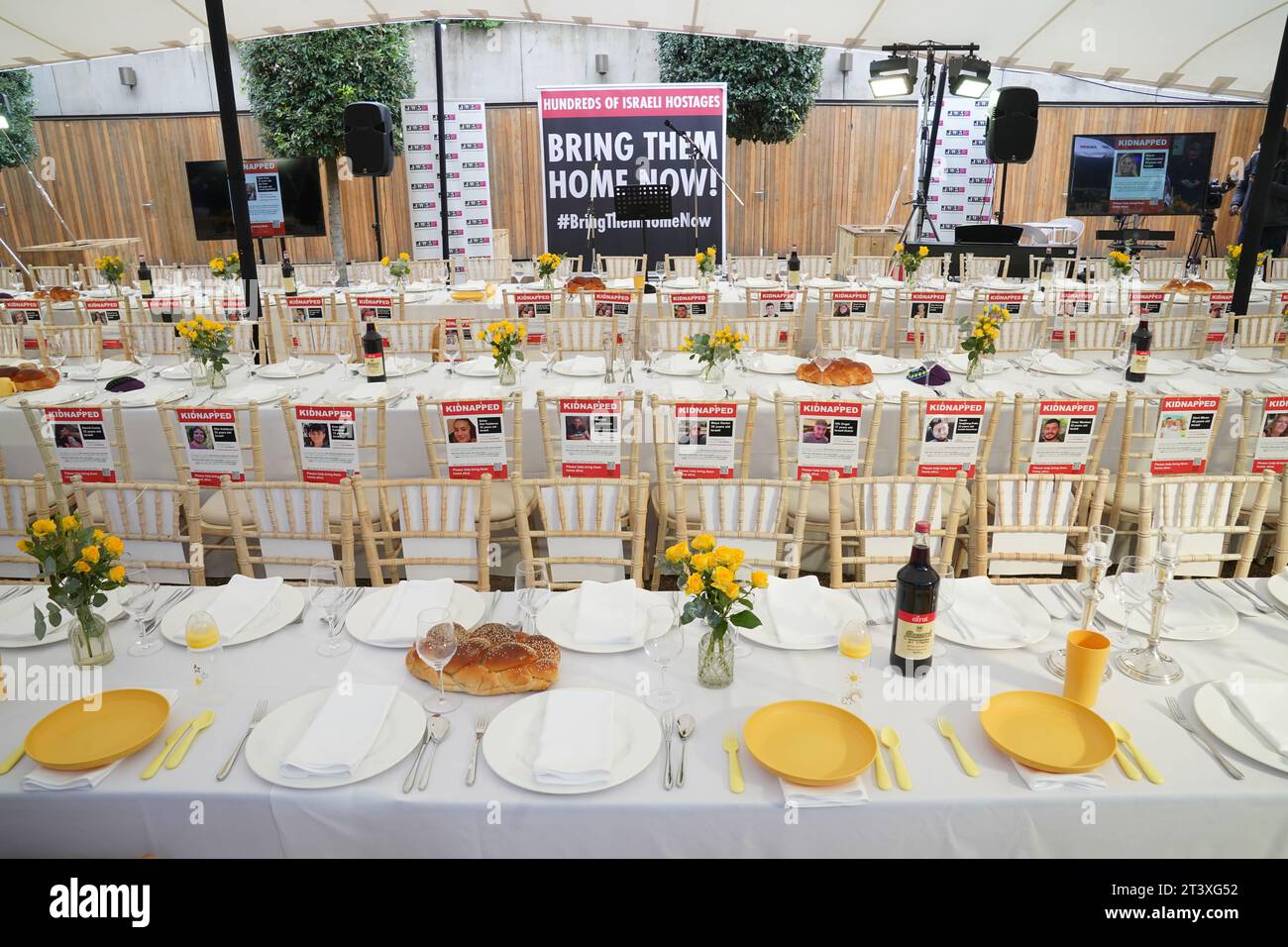The Empty Shabbat Table installation, an empty dining table set for ...
