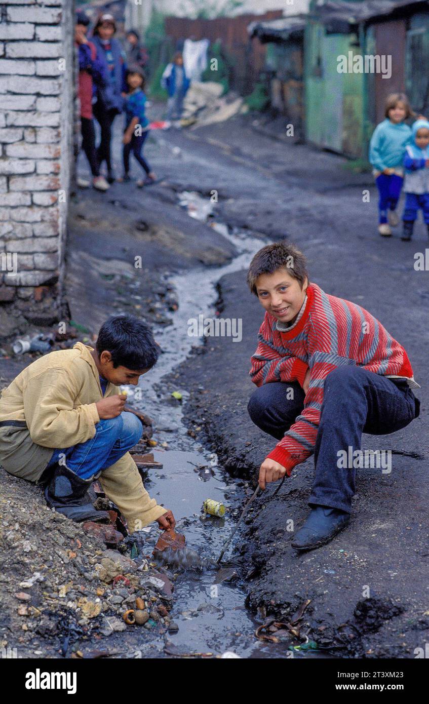 Bulgaria, Sofia. Children at an open sewer in the slum they live Stock ...