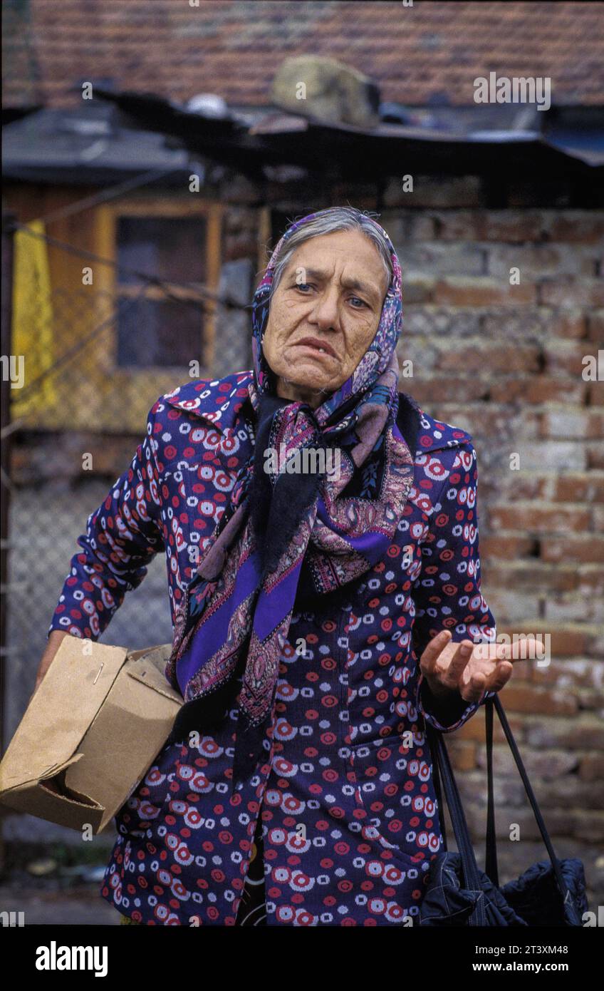Bulgaria , in a Sofia slum an old roma woman is begging for food Stock ...