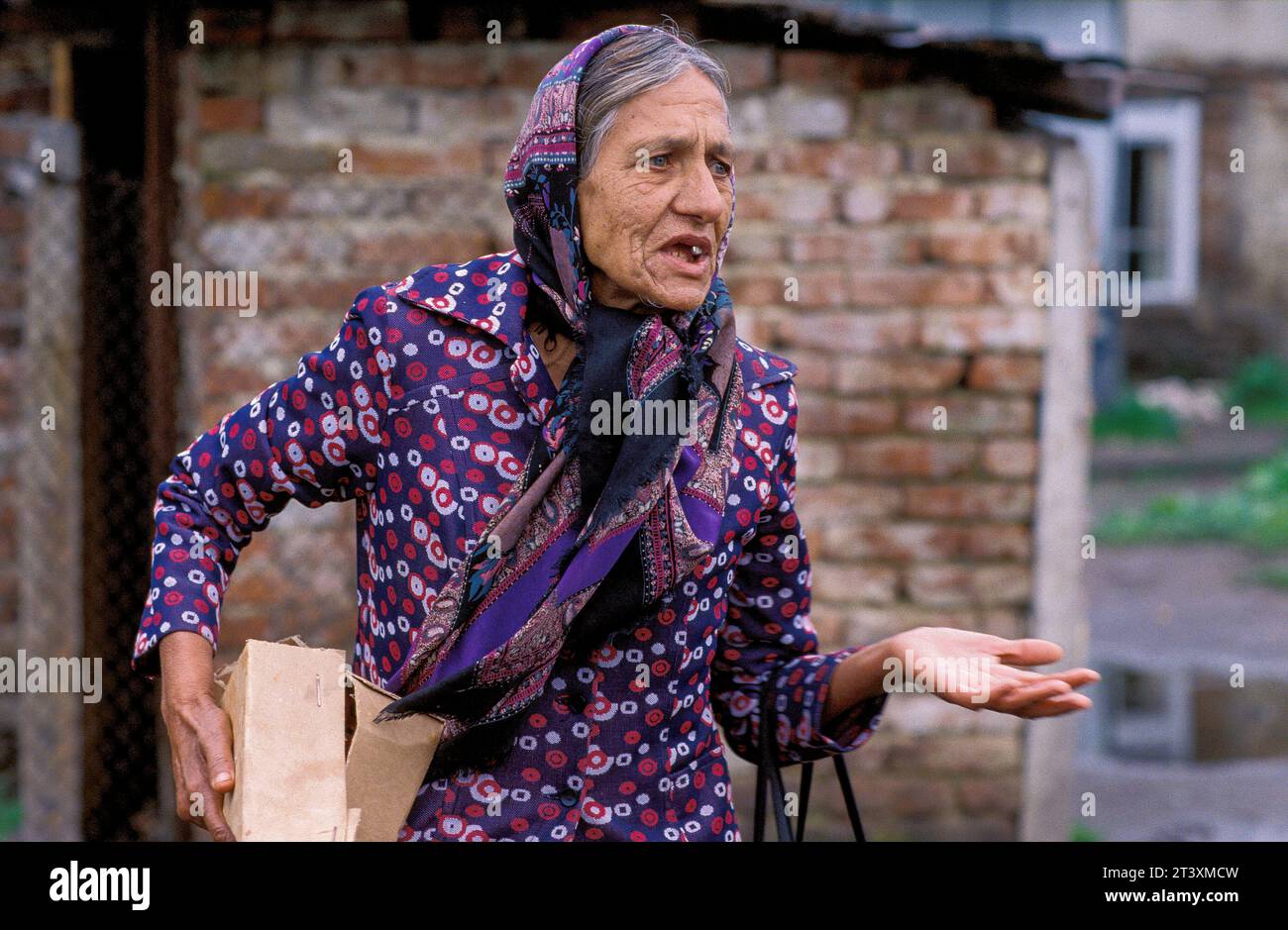 Bulgaria , in a Sofia slum an old roma woman is begging for food Stock ...