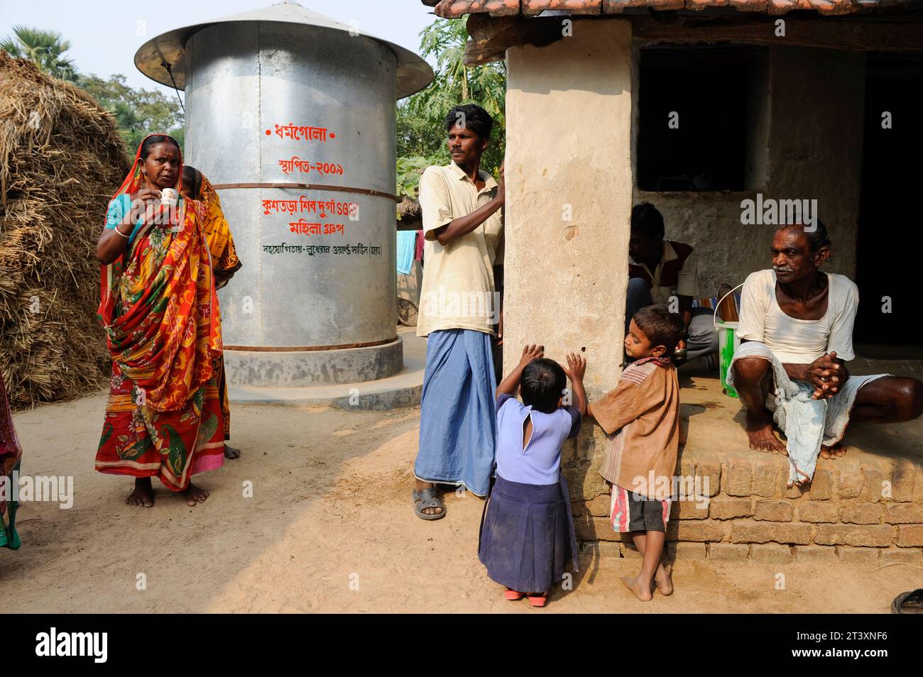 INDIA, Westbengal , dalit village Kustora , rice storage silo for food ...