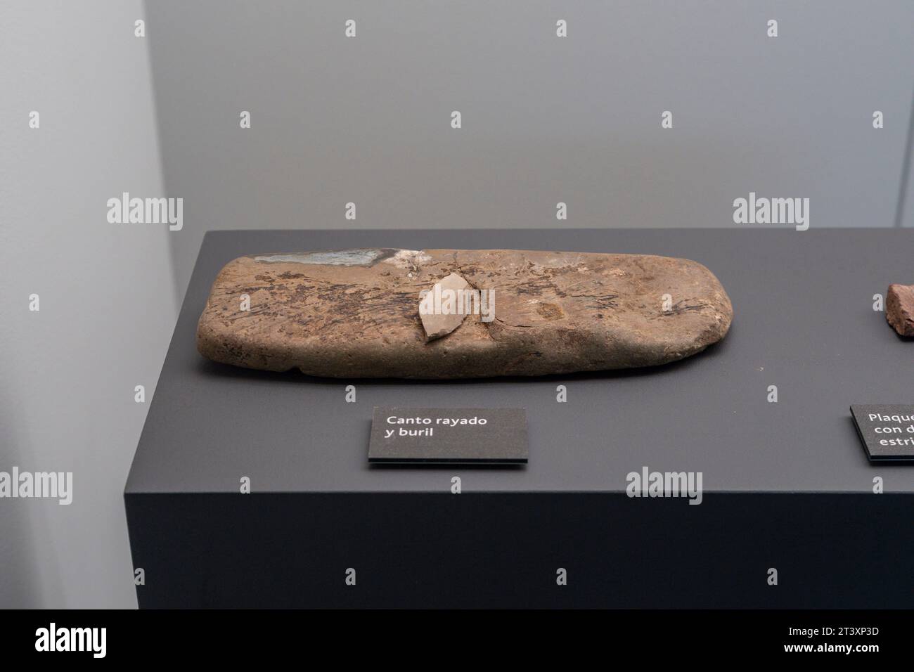 scratched stone and burin, (around 19000 BC), Navarra,Spain Stock Photo ...