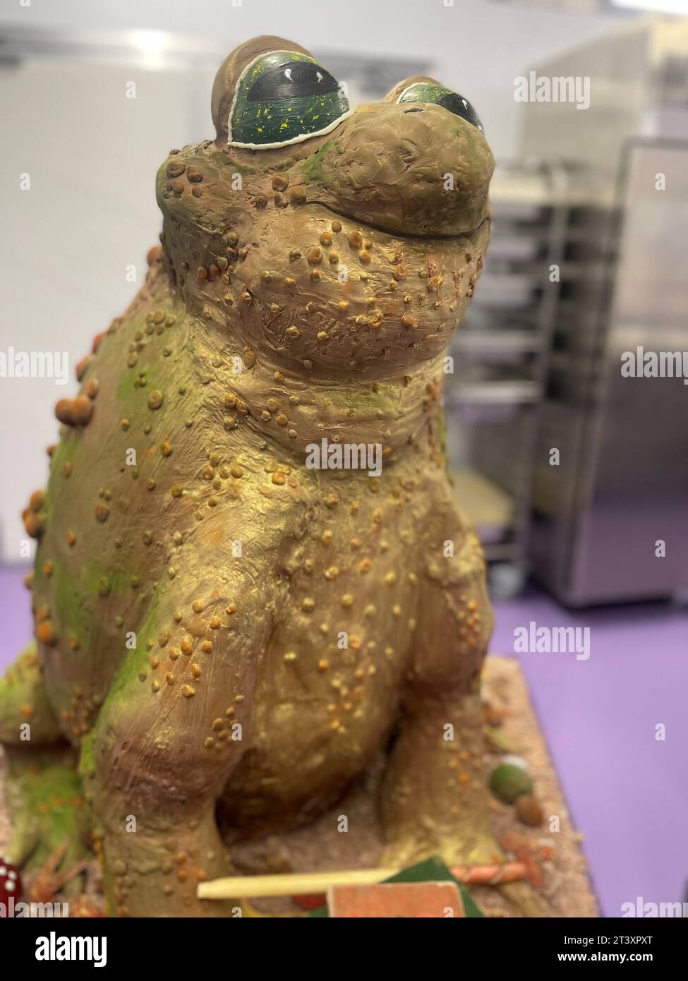 A Halloween display featuring a spooky toad complete with autumnal ...