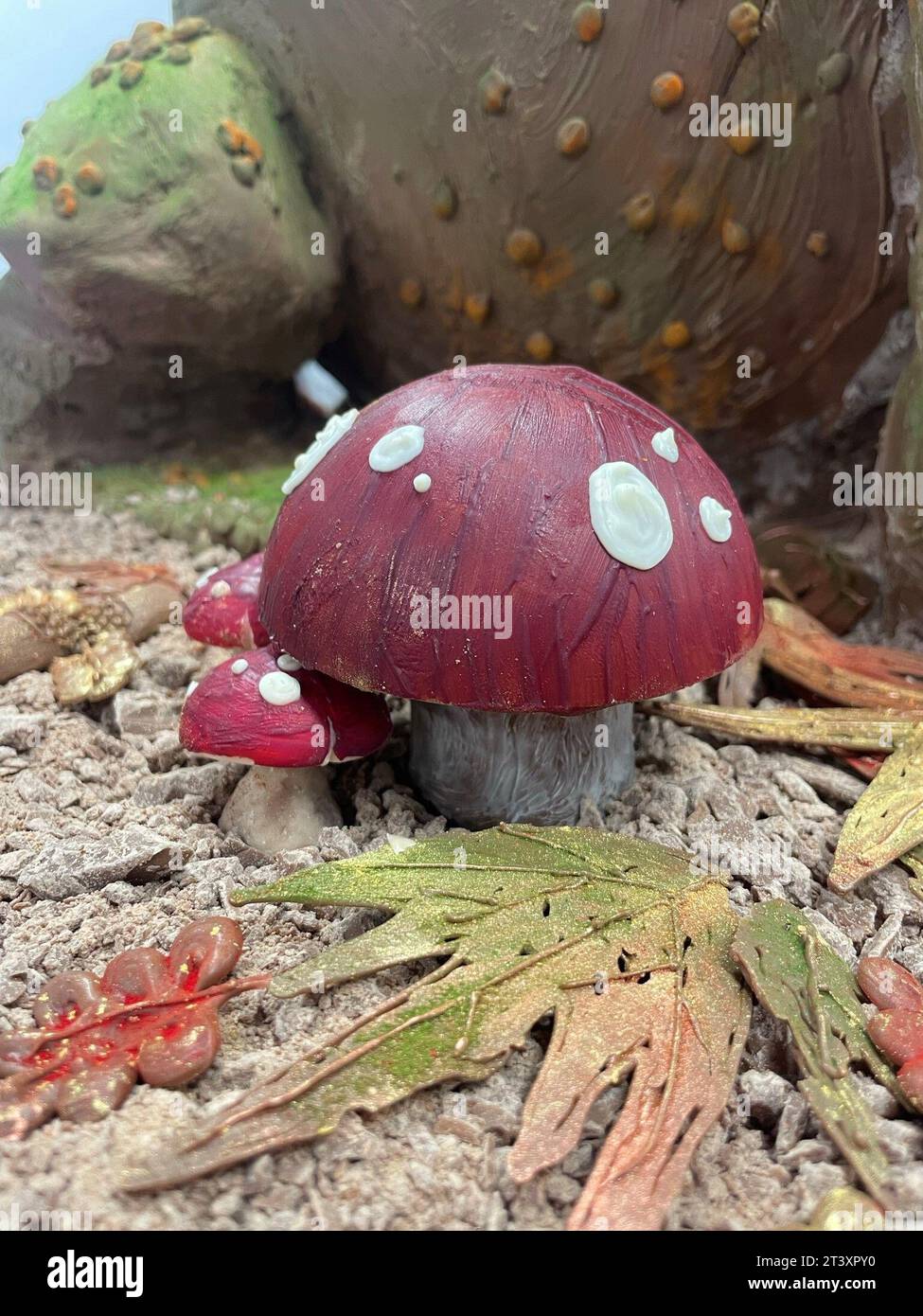 A Halloween display featuring a spooky toad complete with autumnal ...