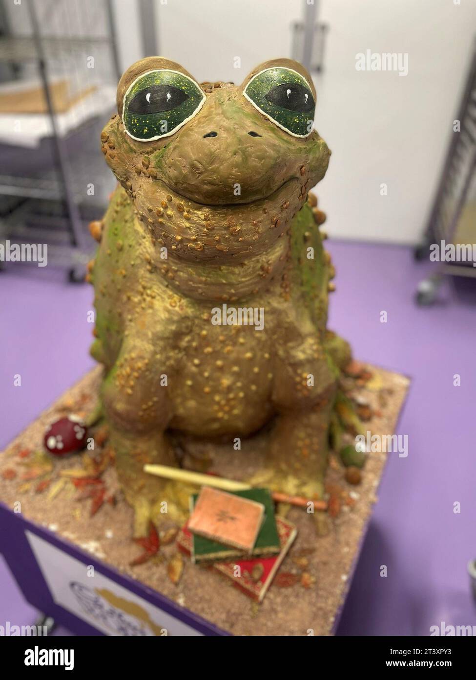 A Halloween display featuring a spooky toad complete with autumnal ...