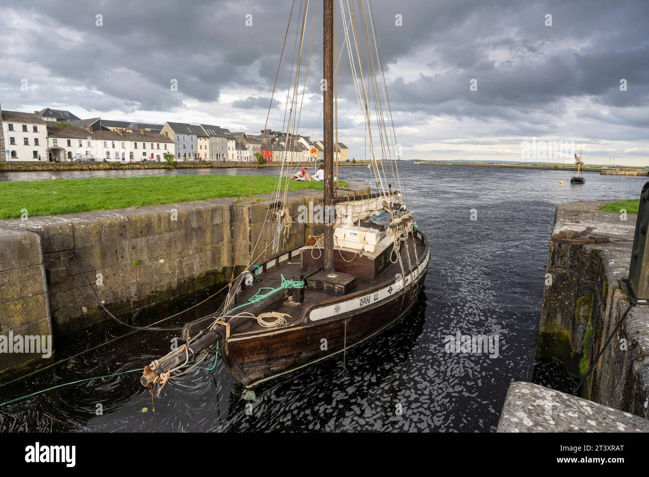 boat anchored in Eglinton Canal Sea Lock, The Long Walk, Galway ...