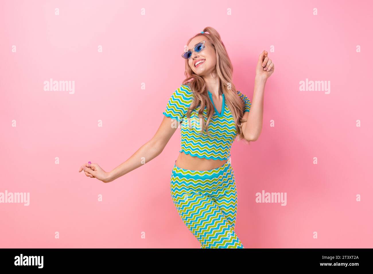 Portrait of cheerful pretty girl with tails hairdo dressed colorful ...