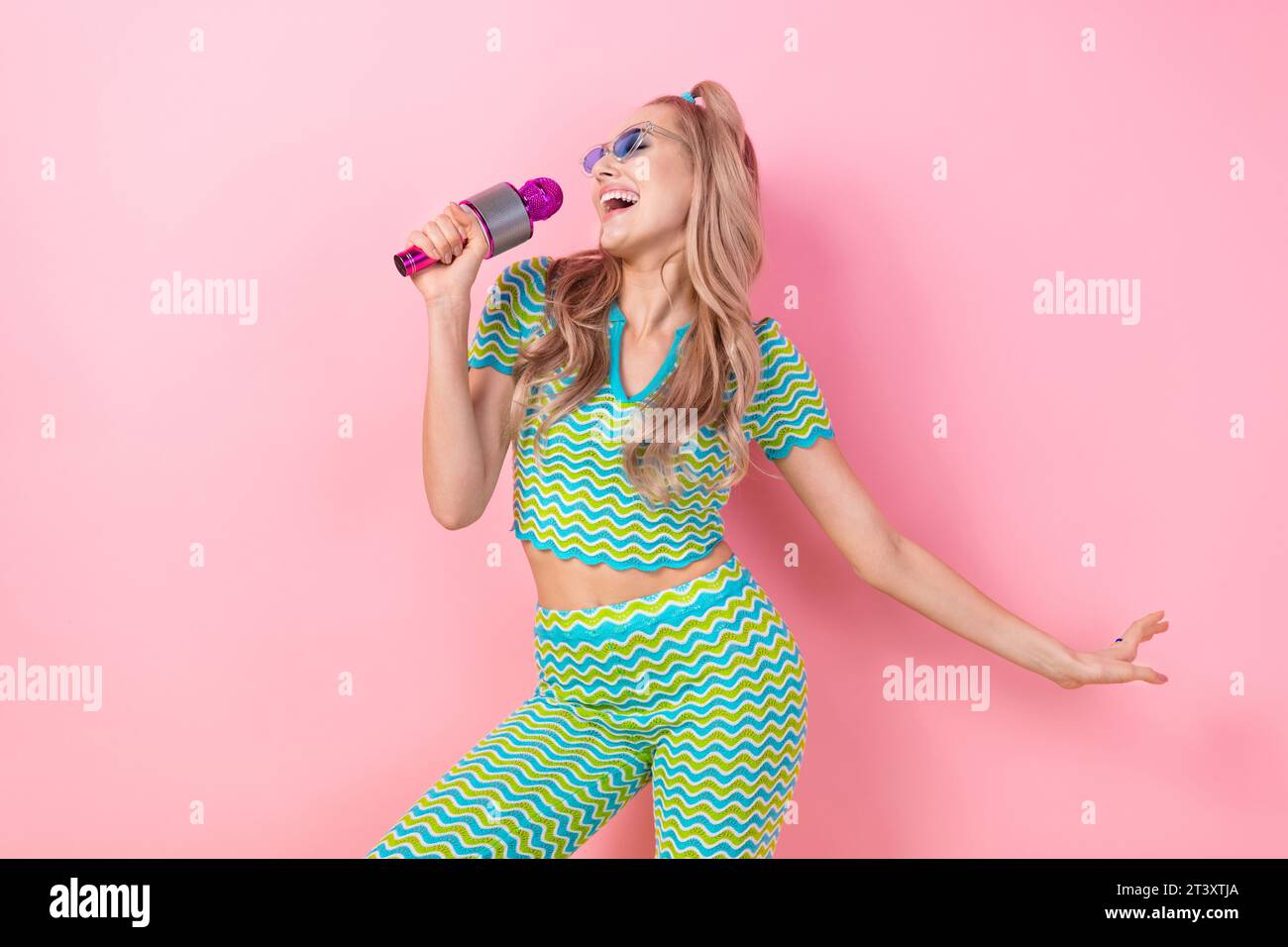 Portrait of pretty girl with tails dressed colorful suit in blue ...