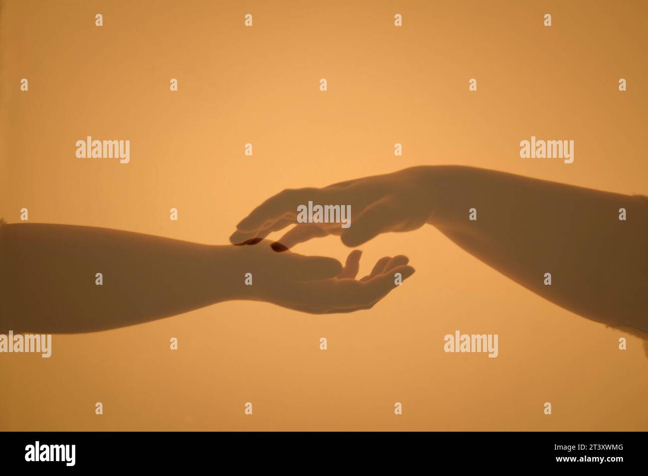 symbolic death hand in hand missing someone Stock Photo - Alamy