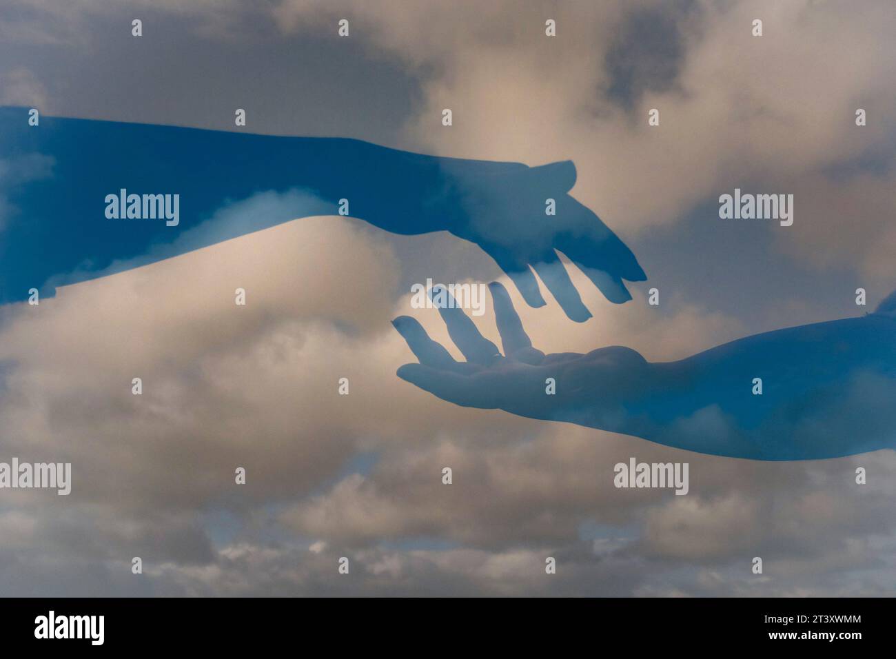 spiritual hands from heaven god and human Stock Photo - Alamy