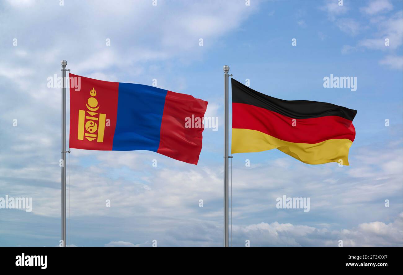 Germany and Mongolia flags waving together on blue cloudy sky, two ...