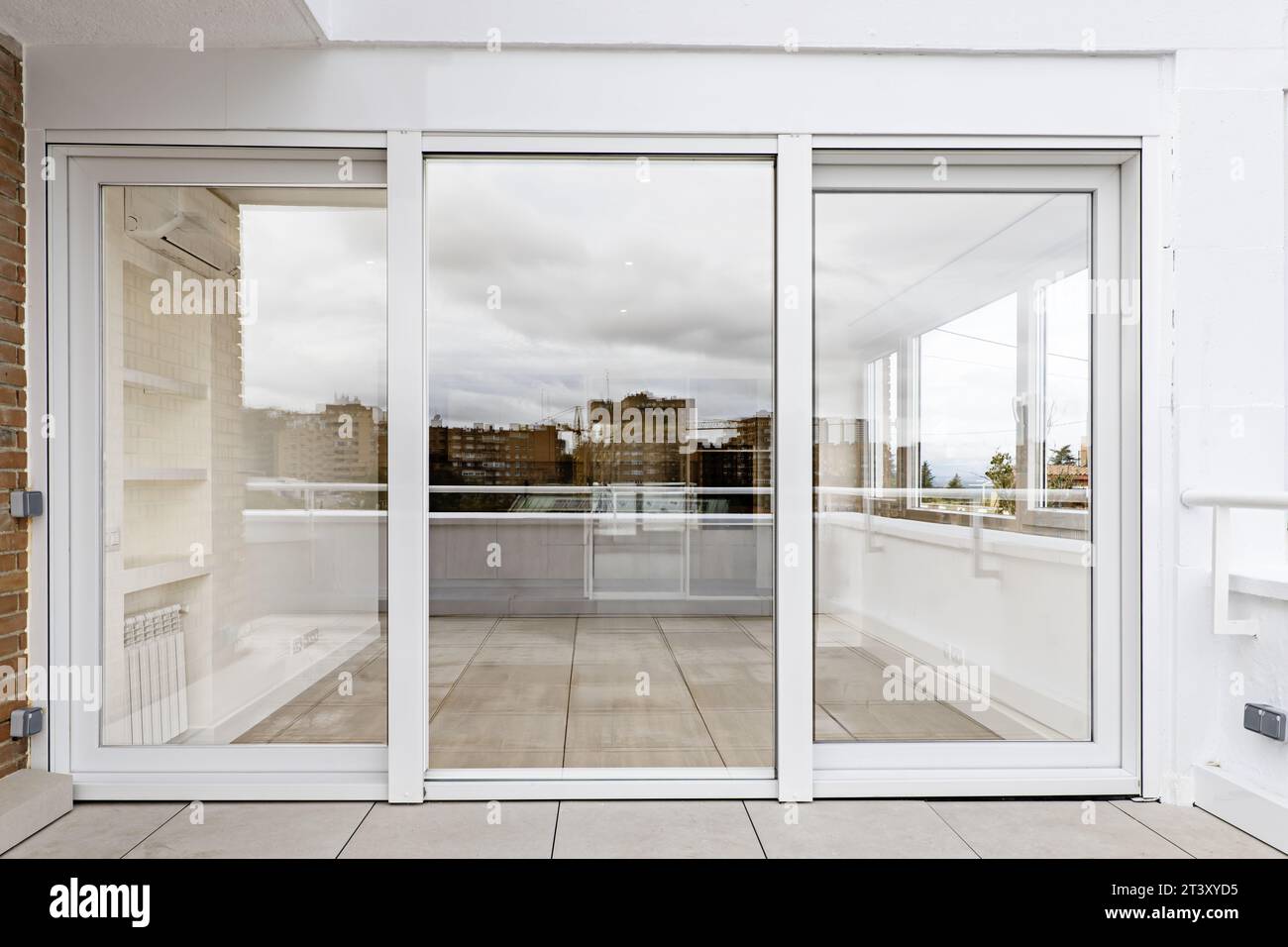 Large folding glass window made of thermal glass and white aluminum ...