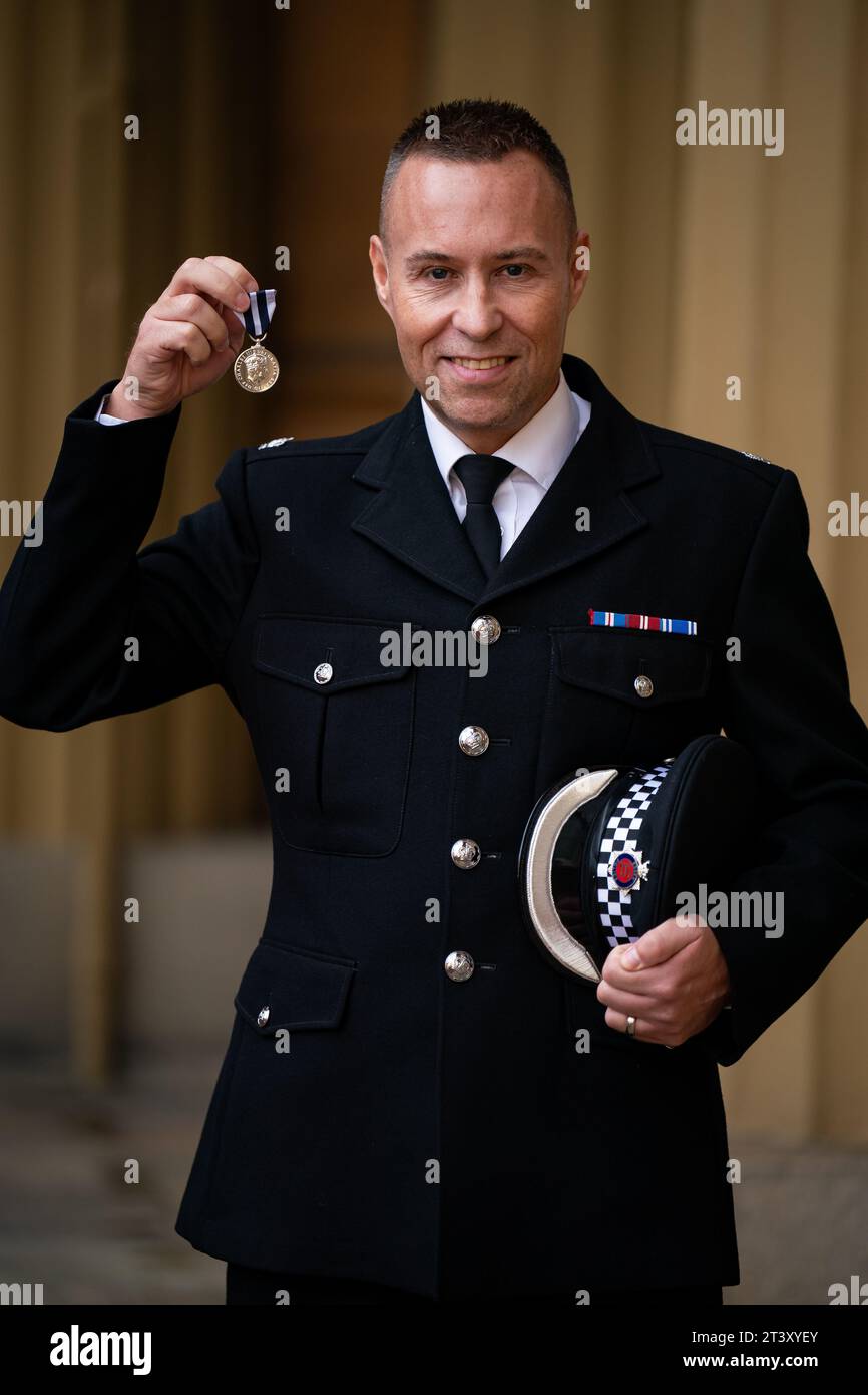 Detective Superintendent Neil Pudney after being decorated with the ...