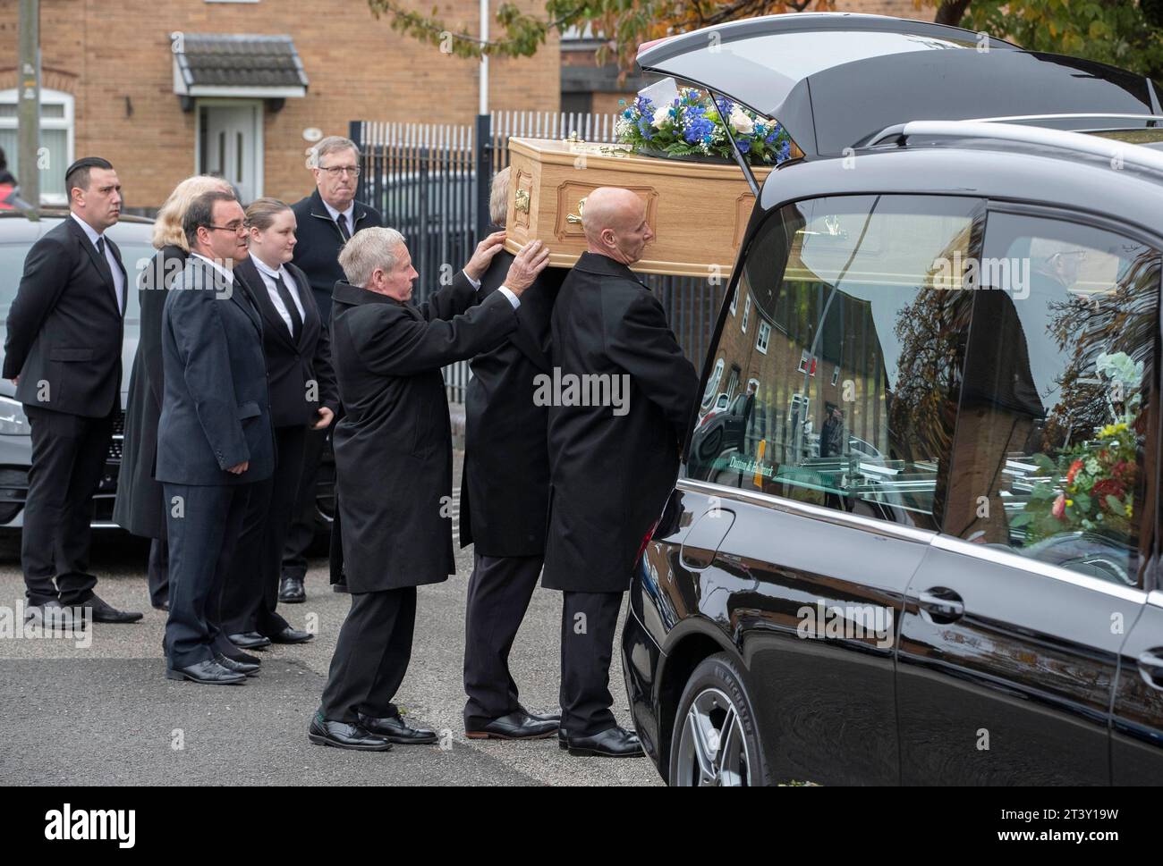 The coffin is carried into St Theresa's Catholic Church, in Chester ...