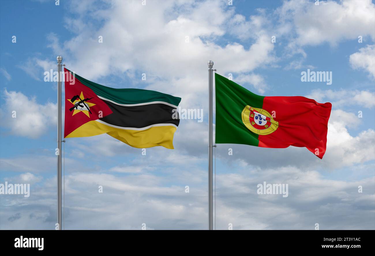 Portugal and Mozambique flags waving together in the wind on blue ...