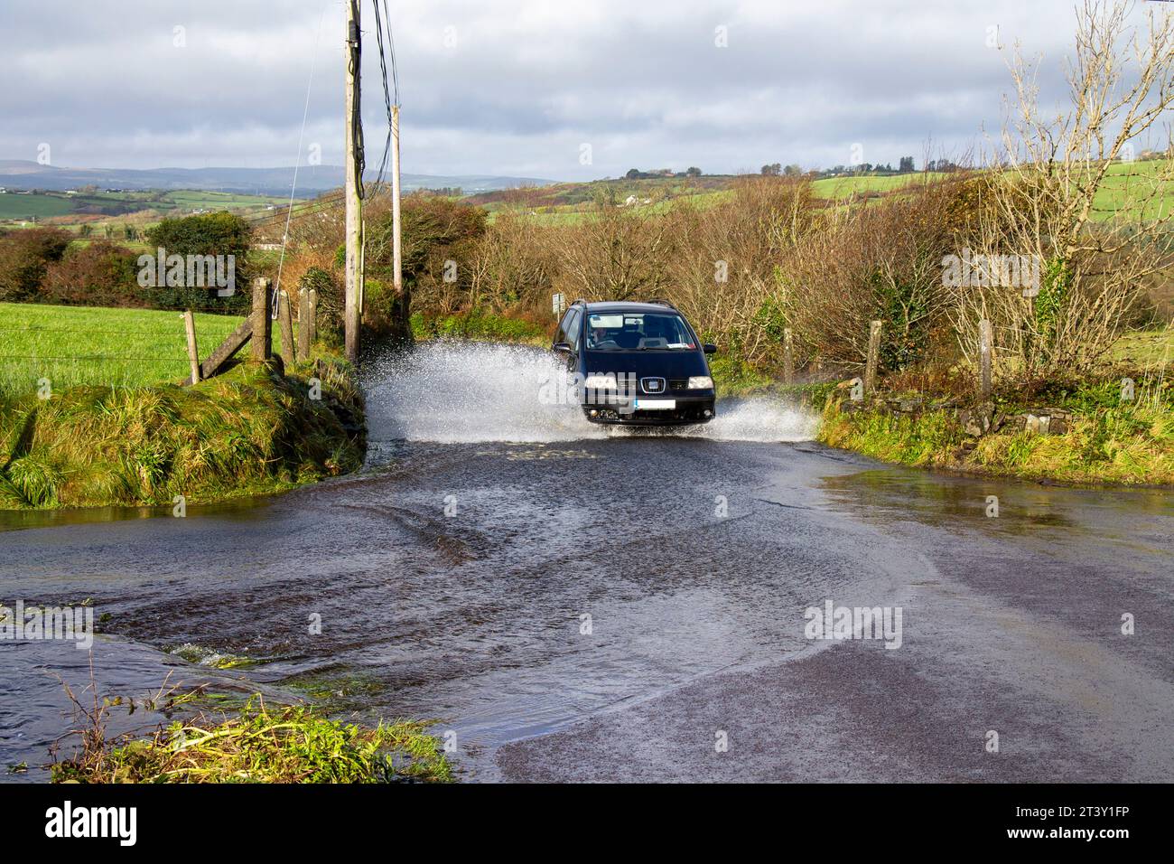 Flooded road by river hi-res stock photography and images - Alamy