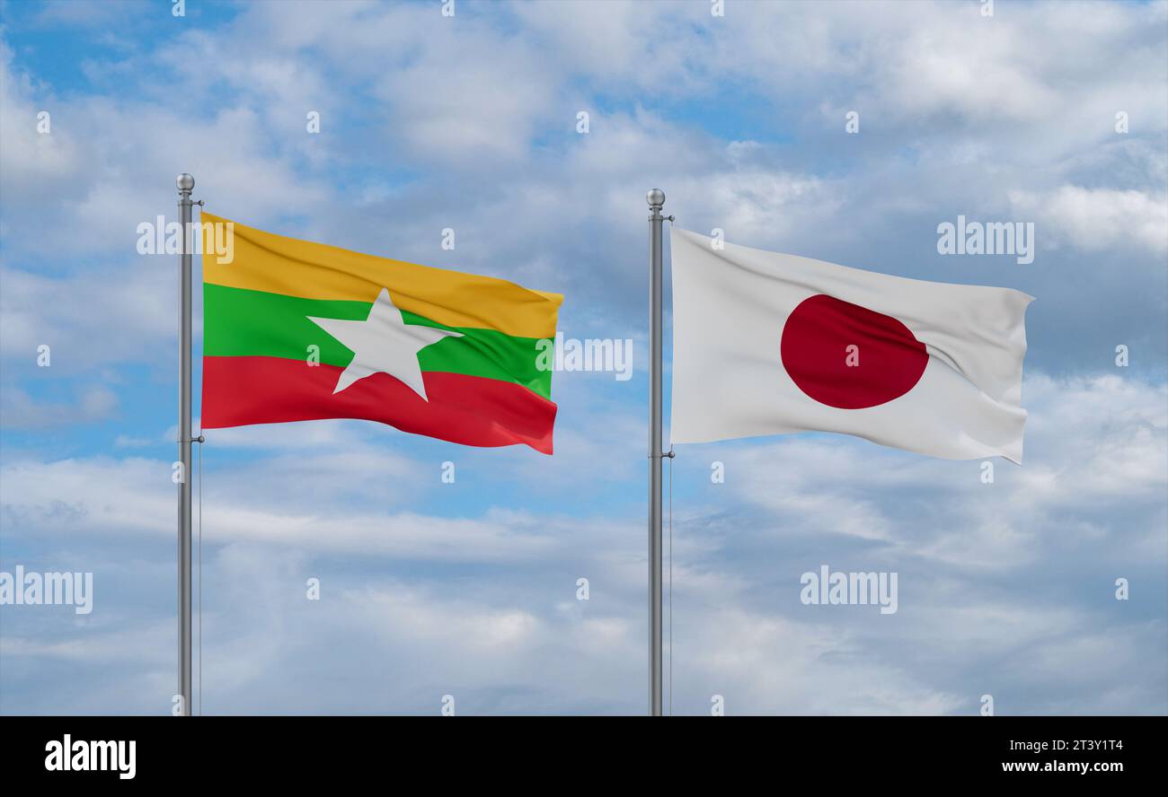 Japan and Myanmar flags waving together on blue cloudy sky, two country ...
