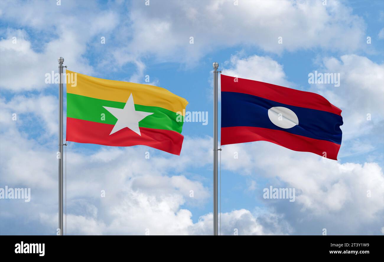 Laos and Myanmar flags waving together on blue cloudy sky, two country ...