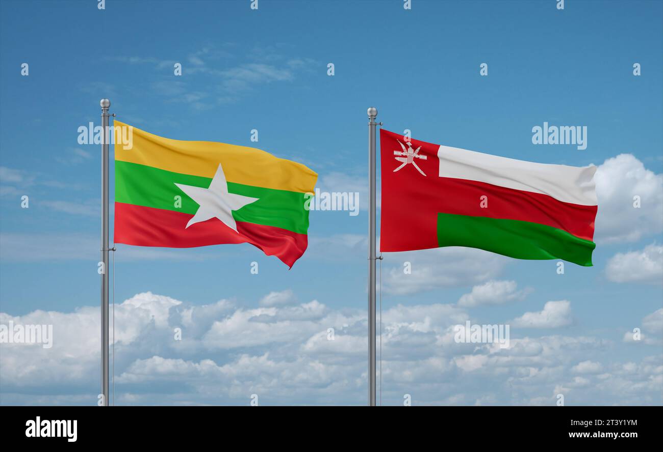 Oman and Myanmar flags waving together in the wind on blue cloudy sky ...